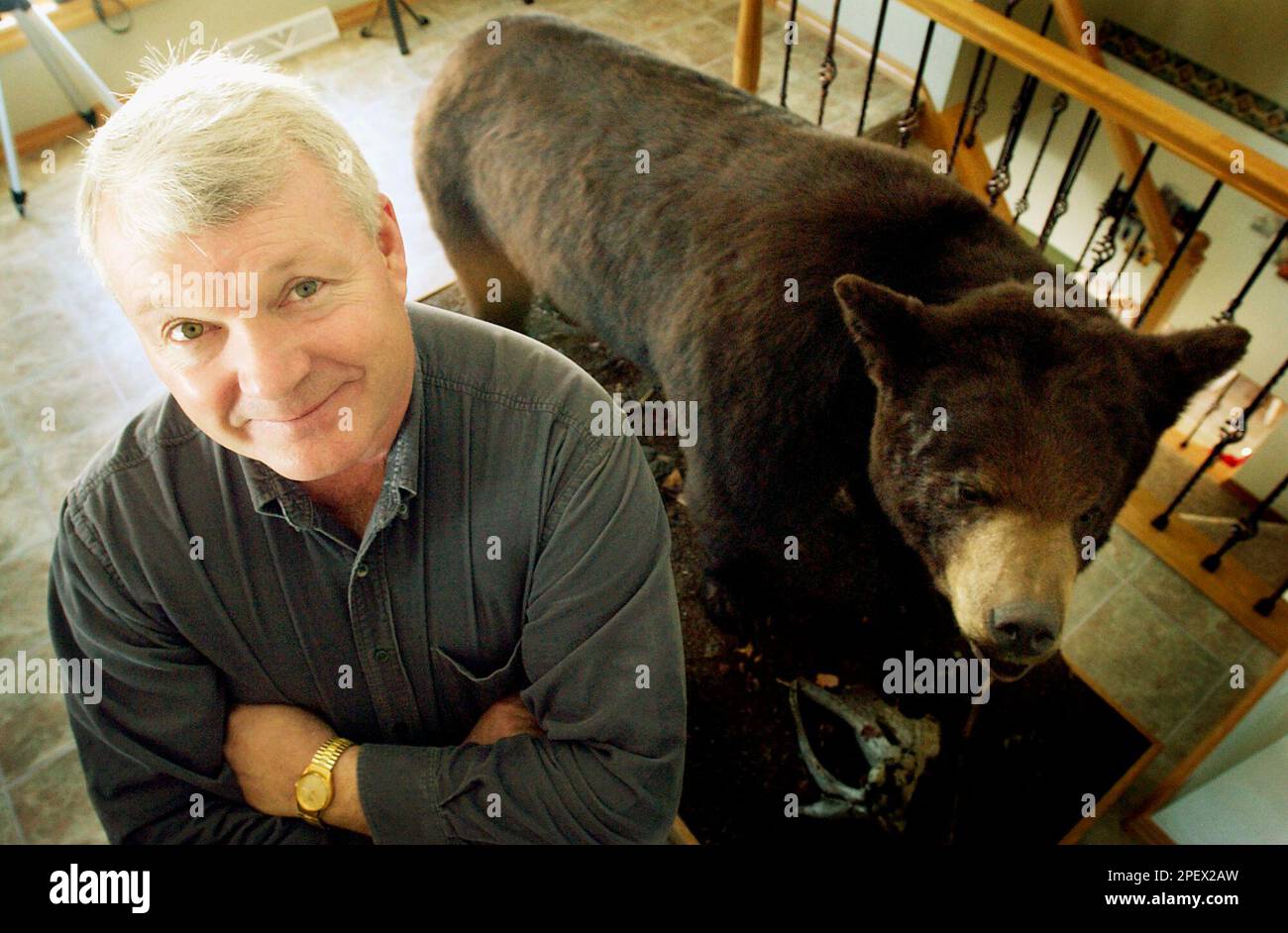 Bear hunter Darrell Thoma poses with, Albert, a 641-pound stuffed black ...