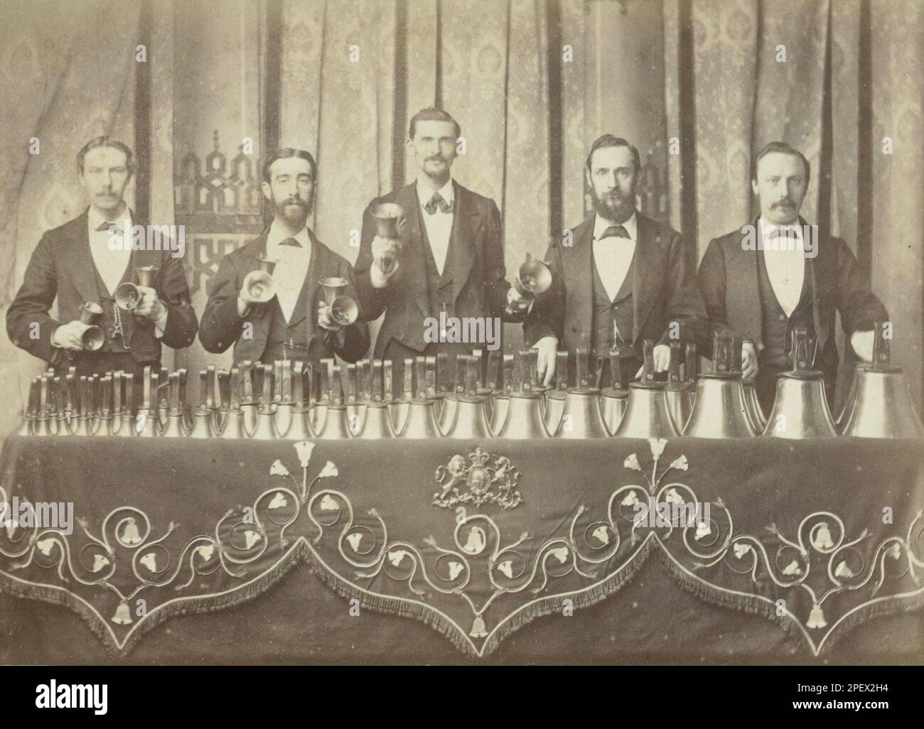 Hand bell ringers hi-res stock photography and images - Alamy