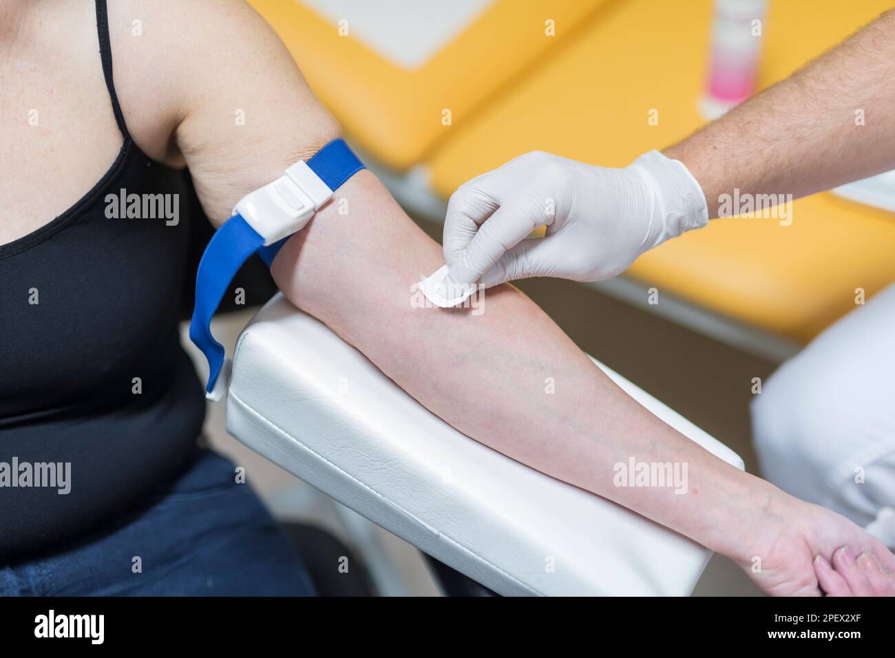 The puncture site is disinfected beforehand Stock Photo - Alamy