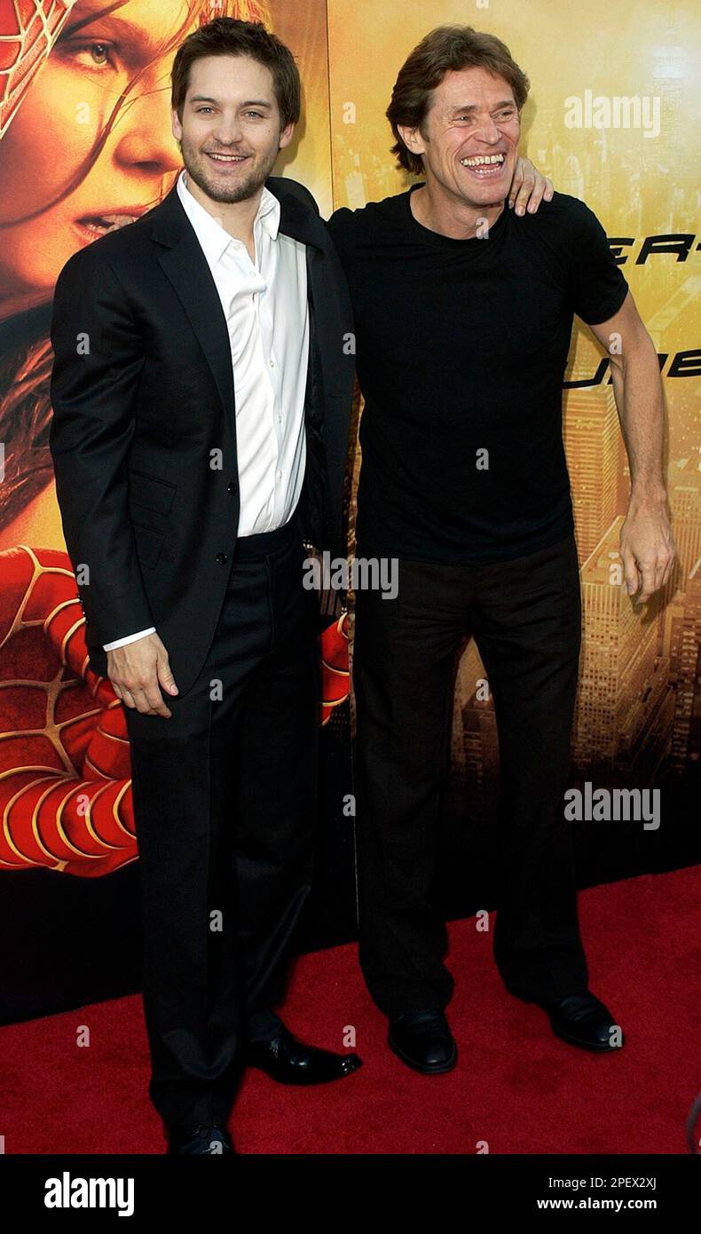 Actors Tobey Maguire and Willem Dafoe pose for photographers at the ...
