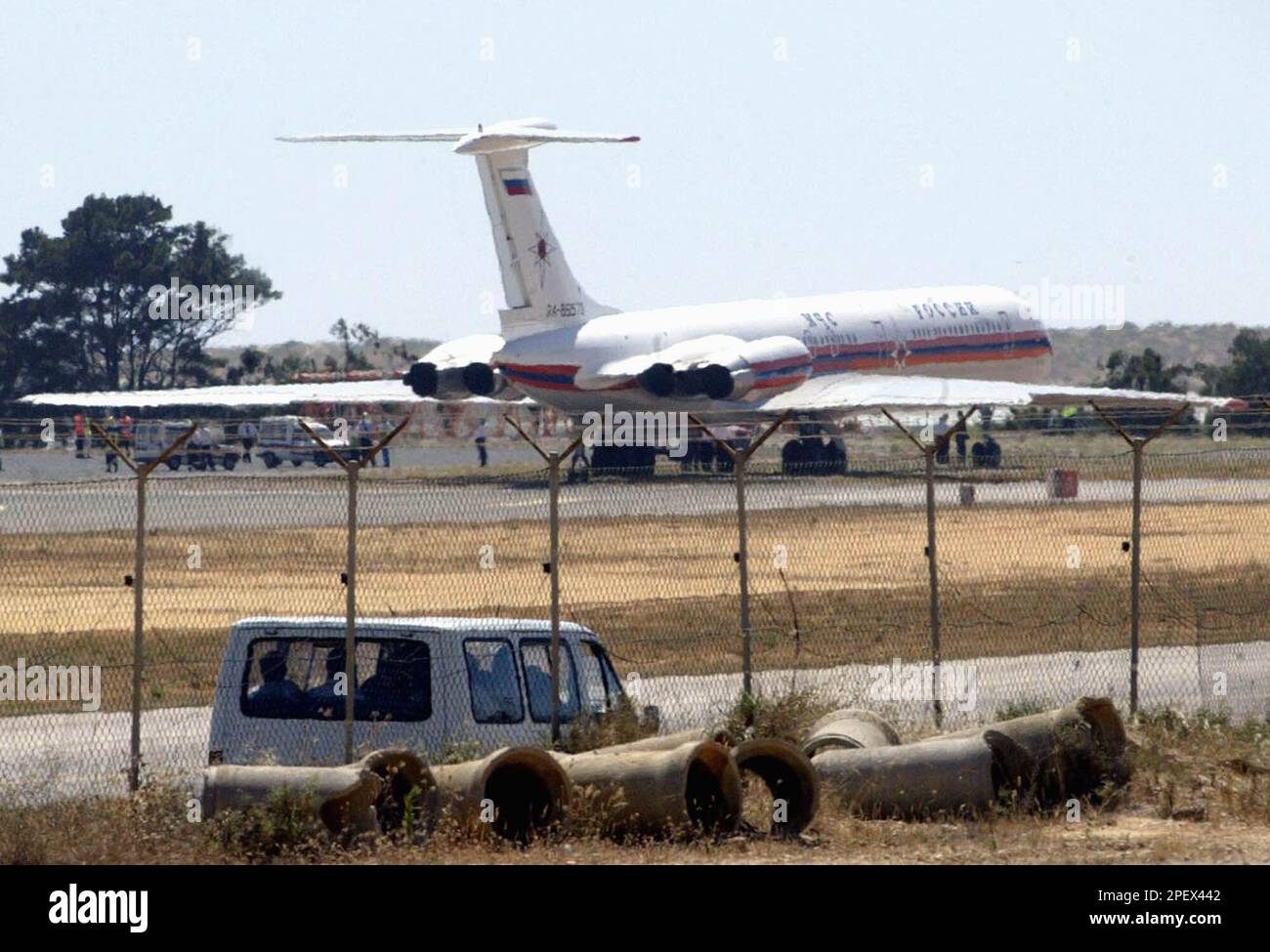 A Russian Ilyushin IL-62 aircraft sits at the end of the runway after a ...