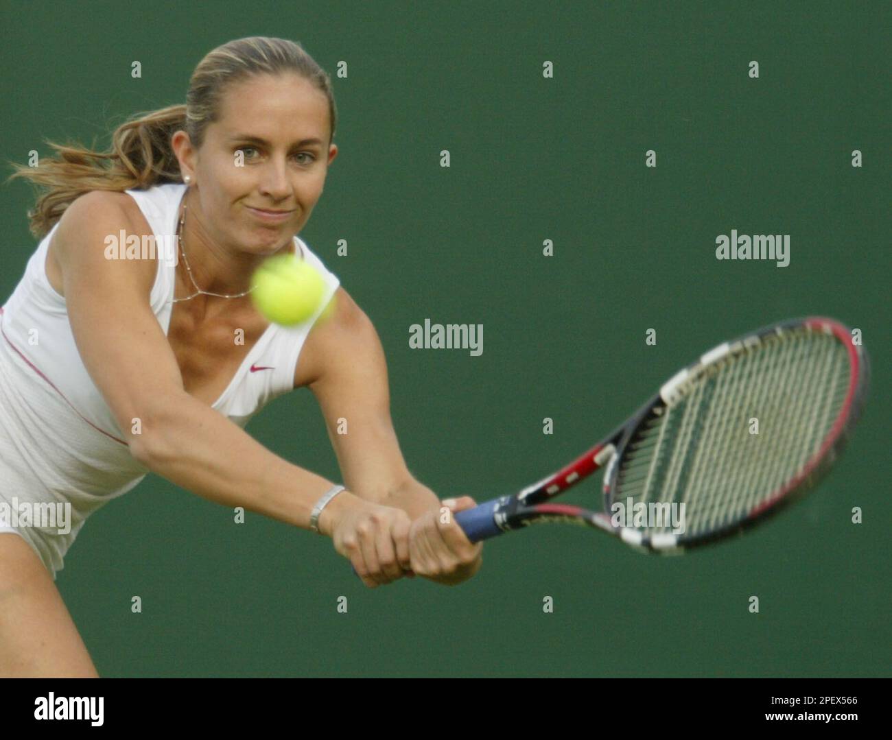 Argentina's Gisela Dulko returns to Serbia's Jelena Dokic, during their ...