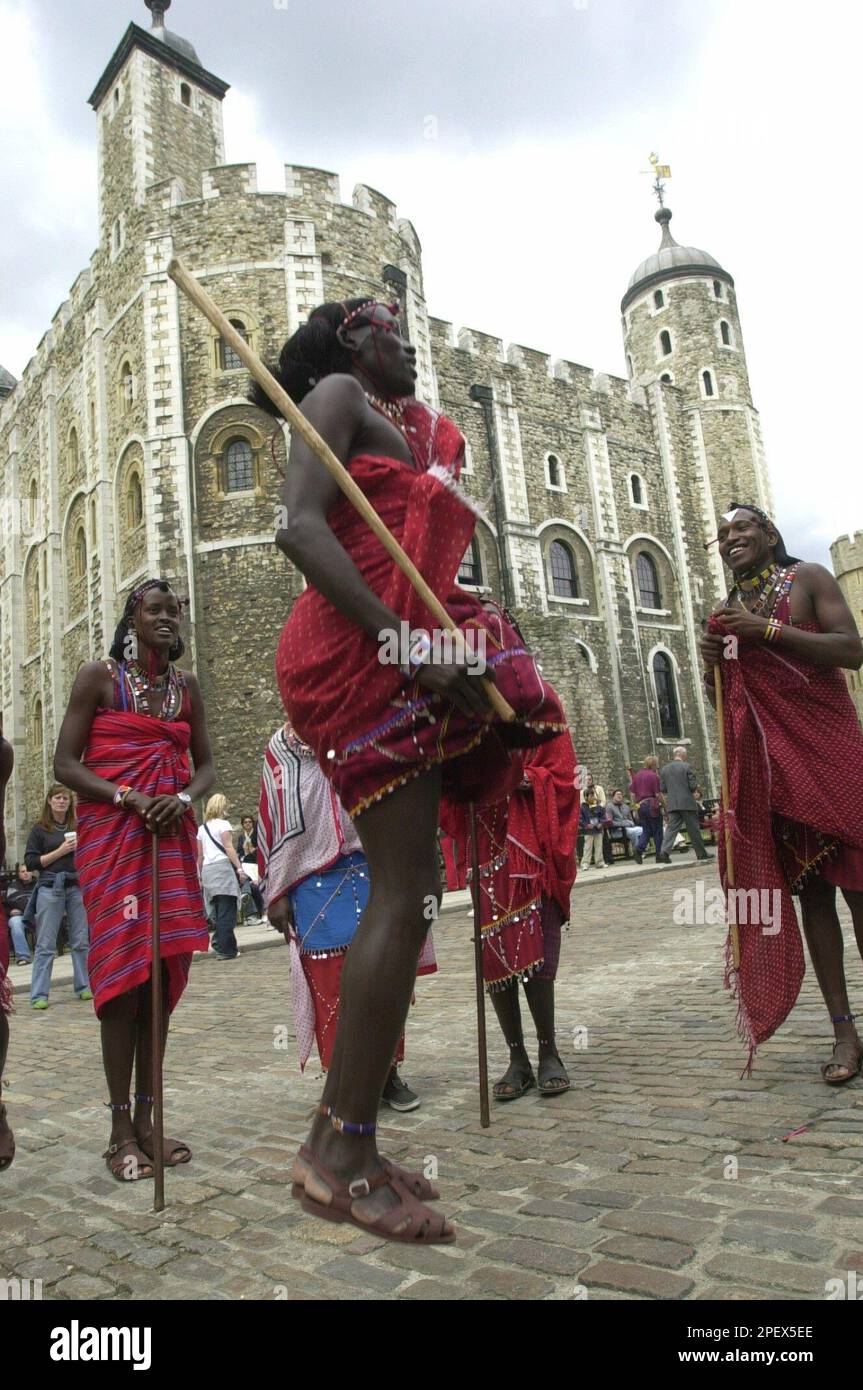 Maasai warriors perform a dance in front of the Tower of London, during ...