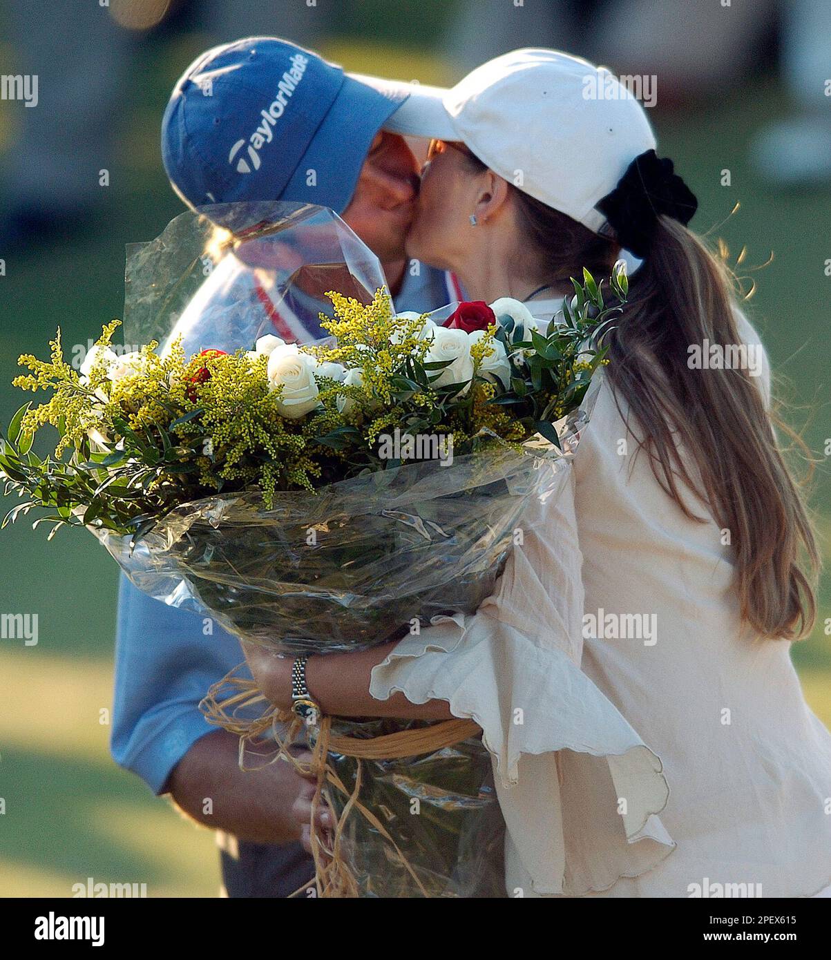 South Africa's Retief Goosen kisses his wife Tracy after his victory at ...