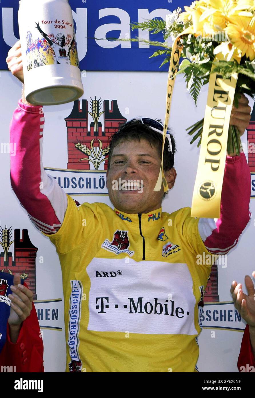 German Jan Ullrich celebrates on the podium after winning the Tour de ...