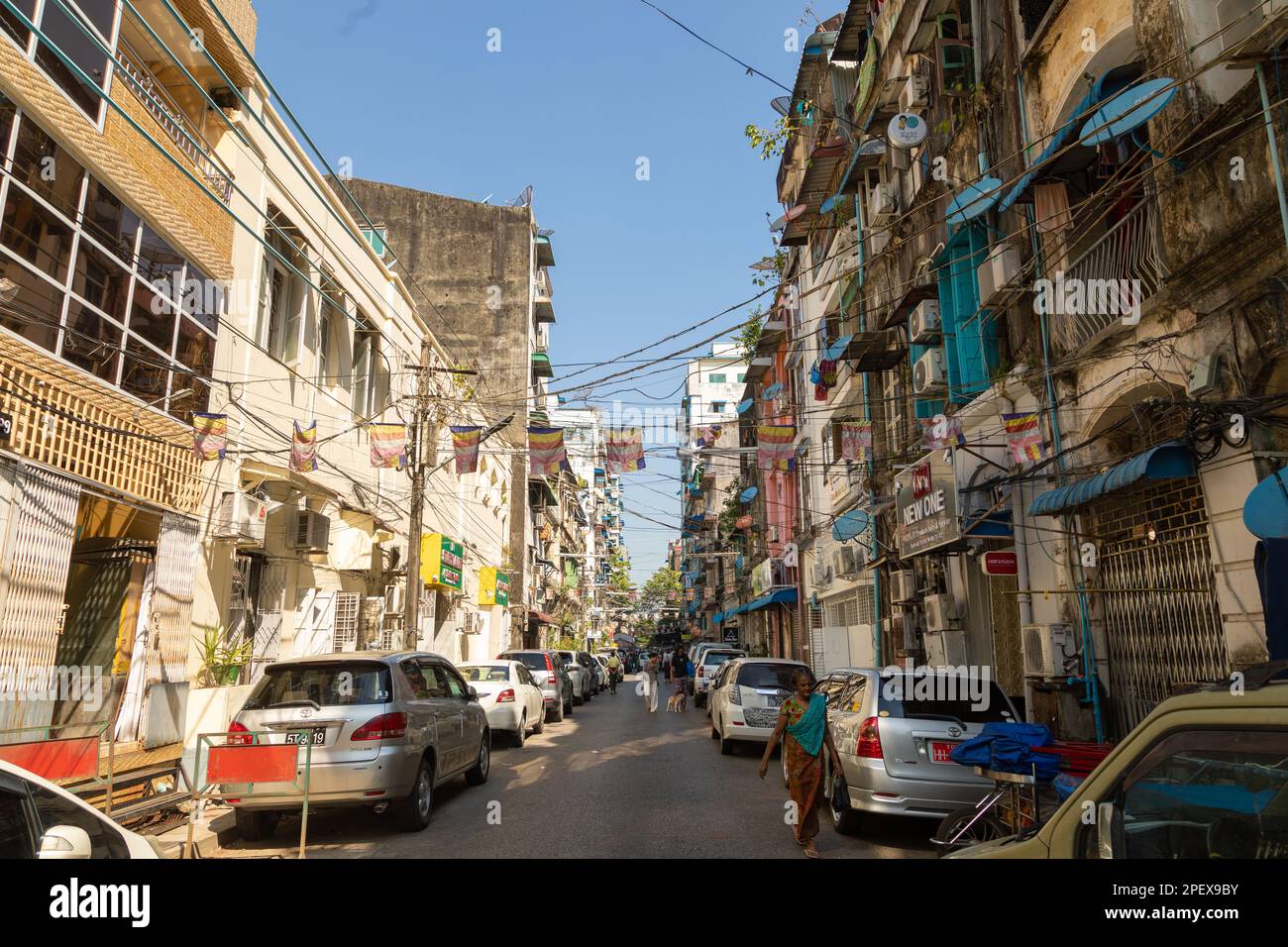 Yangon, Myanmar - Dec 19, 2019: Dirty and degraded streets of the downtown area of Yangon, Burma ...