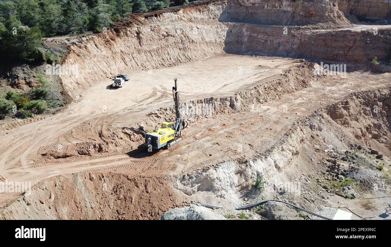 Drilling Machines Working At A Limestone Quarry Stock Photo - Alamy