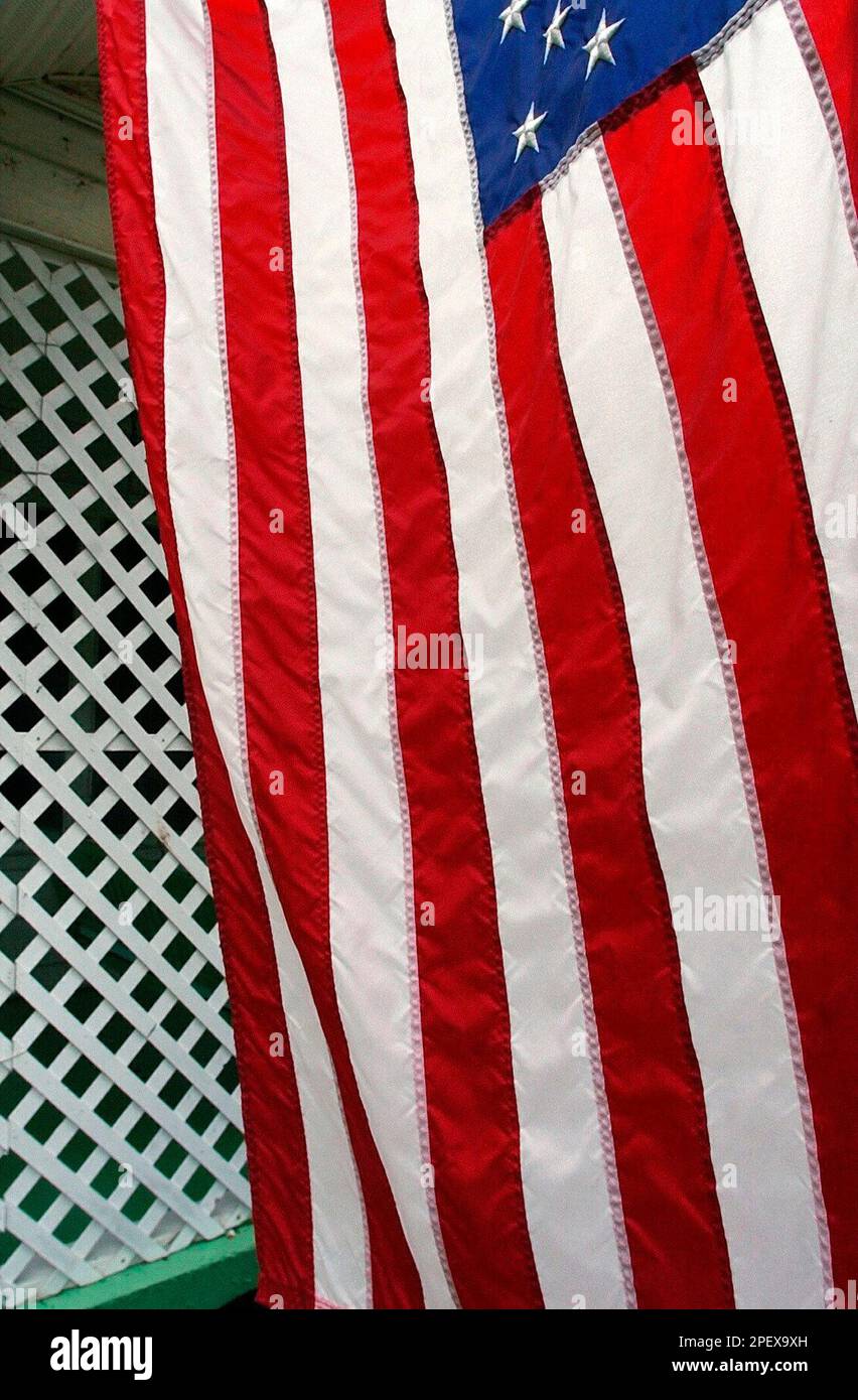 ** ADVANCE FOR SUNDAY, JUNE 20 ** A U.S. flag hangs in front of the ...