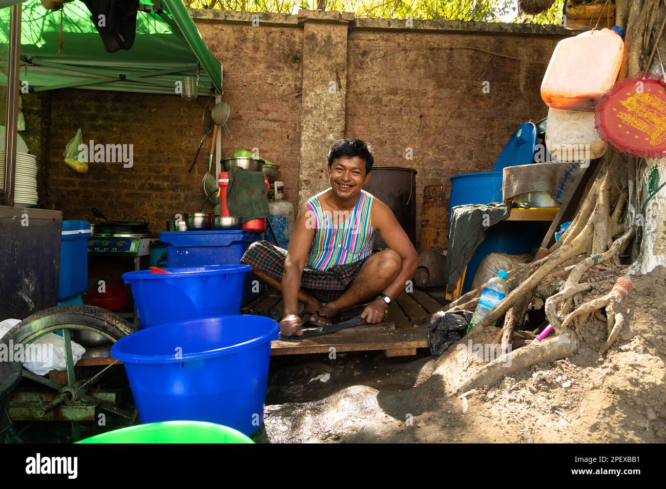 Yangon rangoon man cleaning hi-res stock photography and images - Alamy