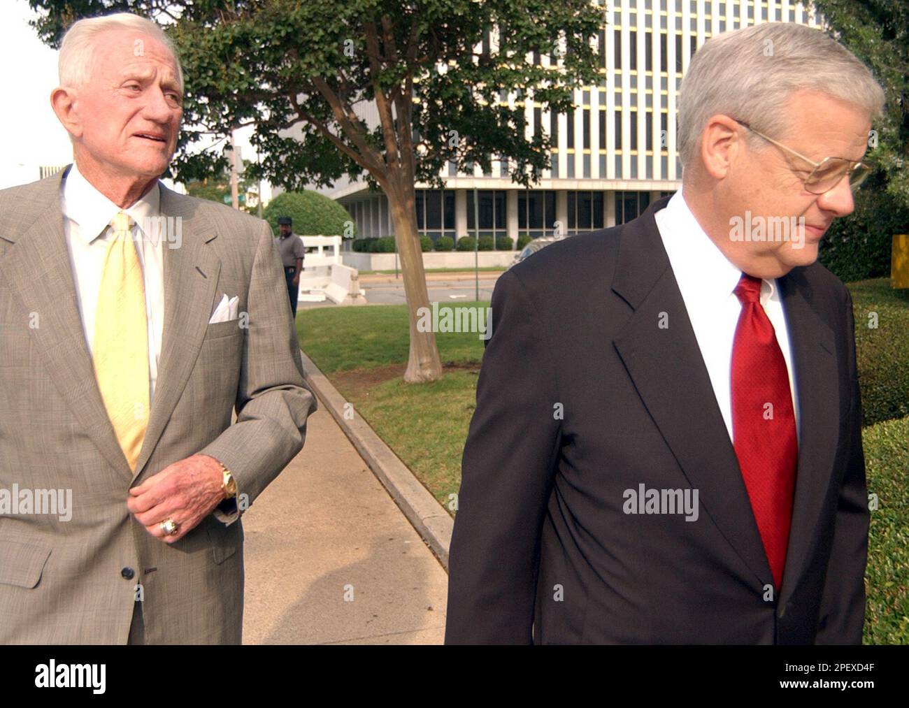University of Arkansas system President B. Alan Sugg, right, and ...