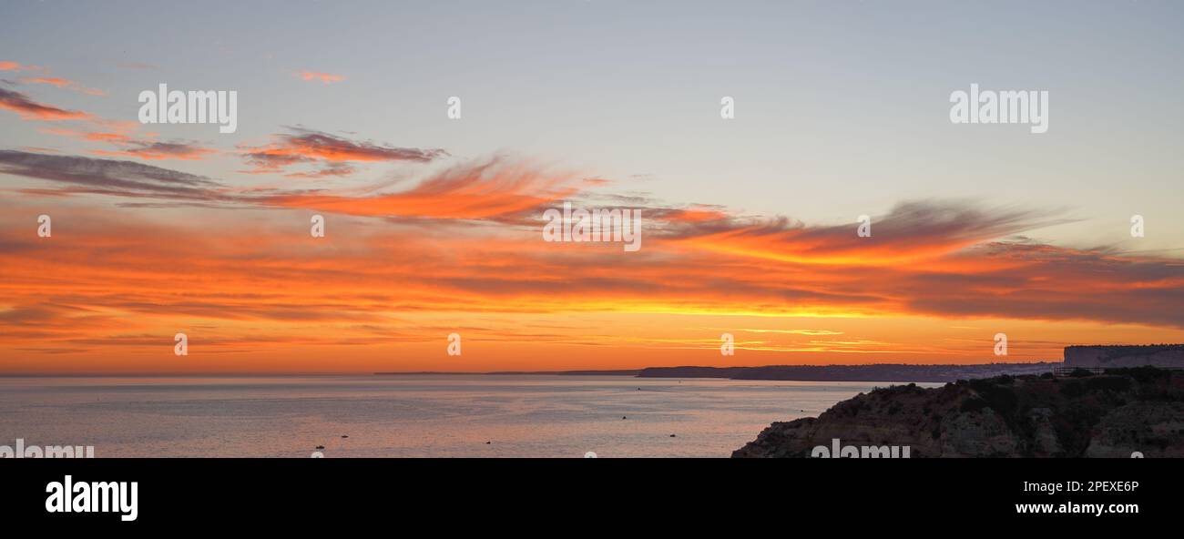 A serene and tranquil Portugal sunset view of a bay in Lagos Stock ...