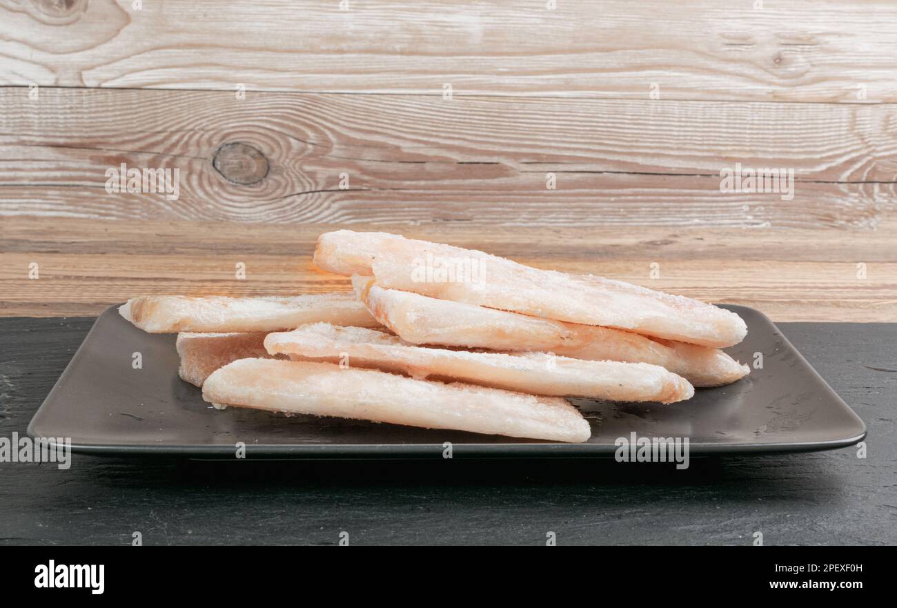Frozen Fish on Wooden Board, White Cod Fillet, Iced Hake Filet, Frozen ...