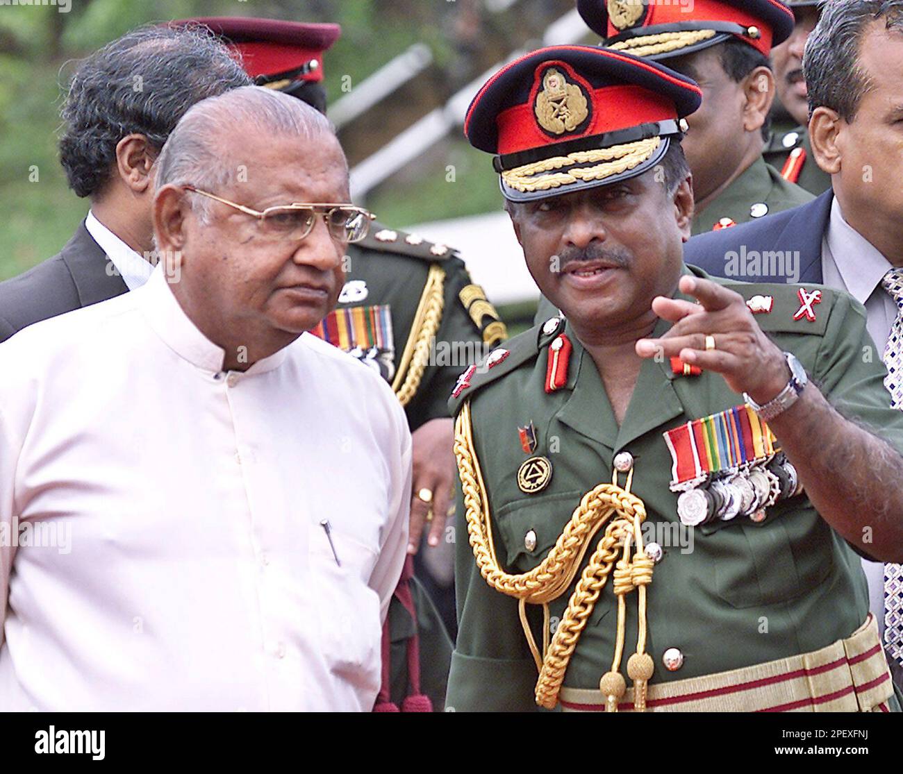 Sri Lankan Deputy Defense Minister Ratnasiri Wickremanayake, left ...