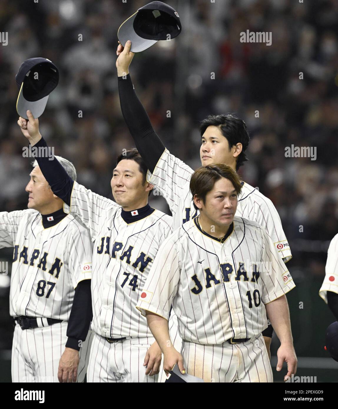 Tokyo, Japan. 16th Mar, 2023. Shohei Ohtani (R, background) and other ...