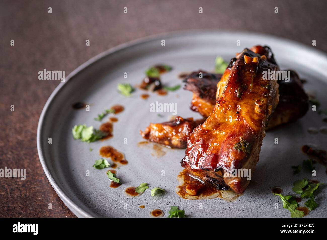 Thai barbecued pork spare ribs Stock Photo - Alamy