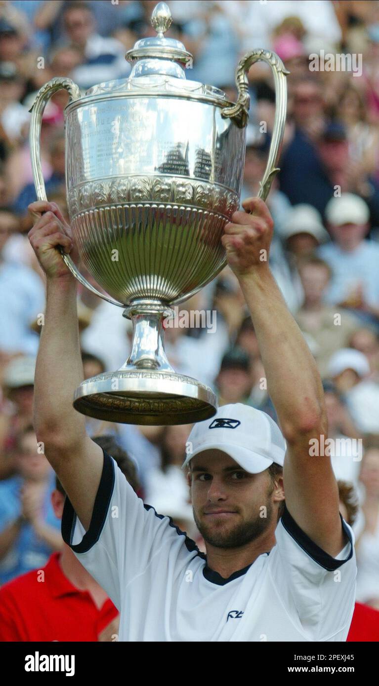 Andy Roddick of the United States holds the Queen's Club grass court ...
