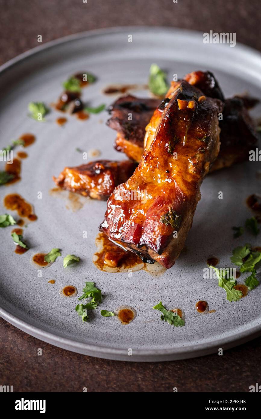 Thai barbecued pork spare ribs Stock Photo - Alamy