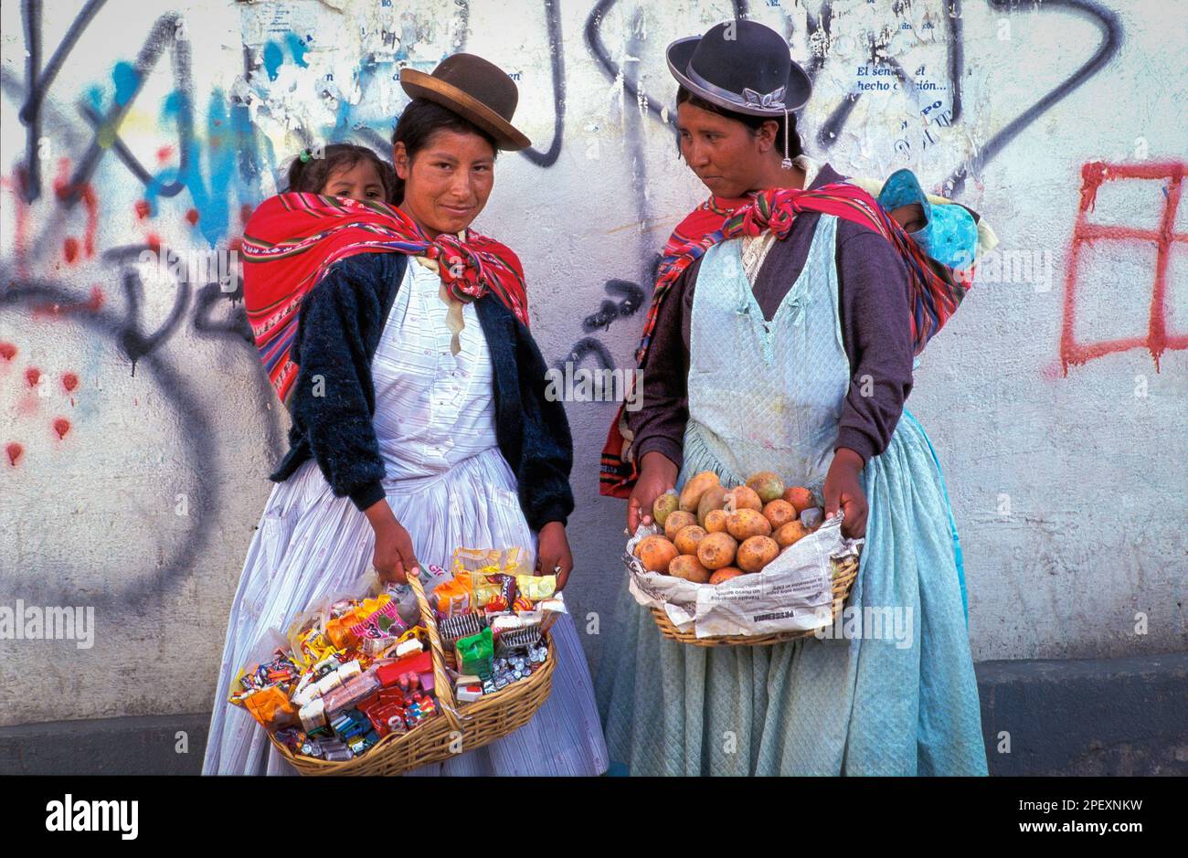 Bolivia, La Paz/El Alto. Women of the Aymara tribe are selling products ...