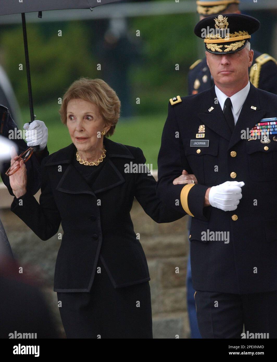 Former first lady Nancy Reagan, escorted by Maj. Gen. Galen Jackman ...