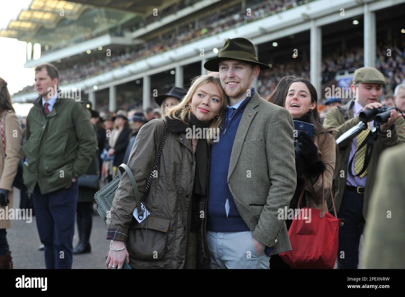Crowds watching Race 6 The Boodles Juvenile Handicap Hurdle known as ...