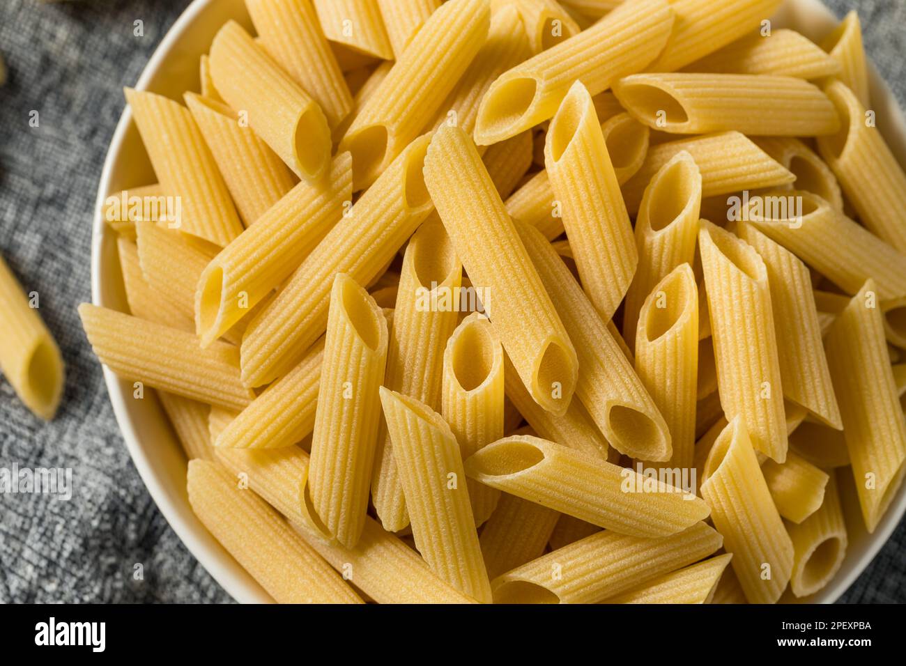 Raw penne pasta hi-res stock photography and images - Alamy