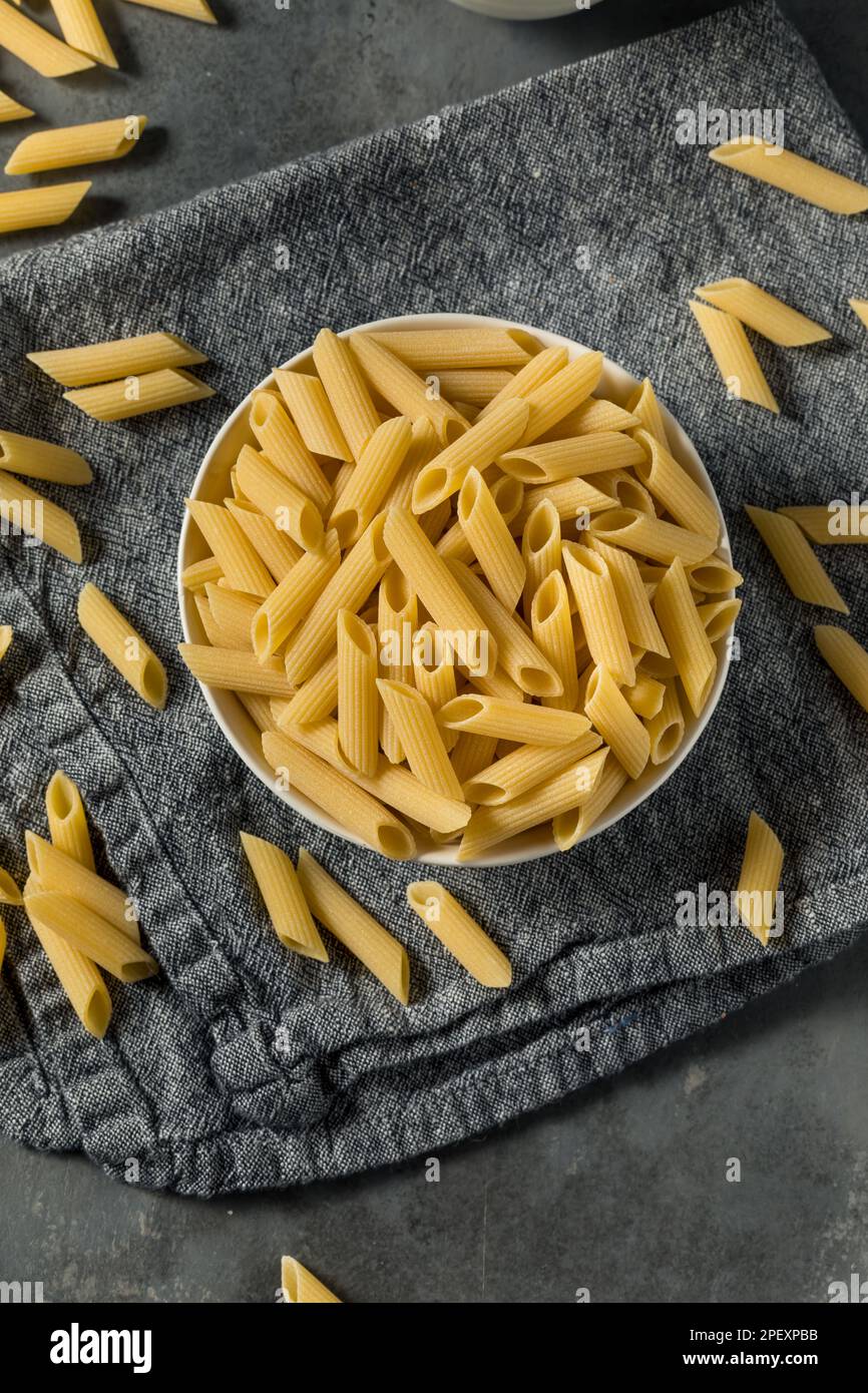Raw penne pasta hi-res stock photography and images - Alamy