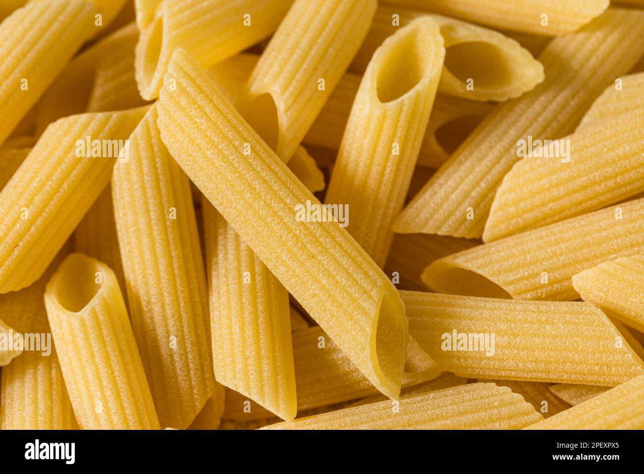 Raw penne pasta hi-res stock photography and images - Alamy