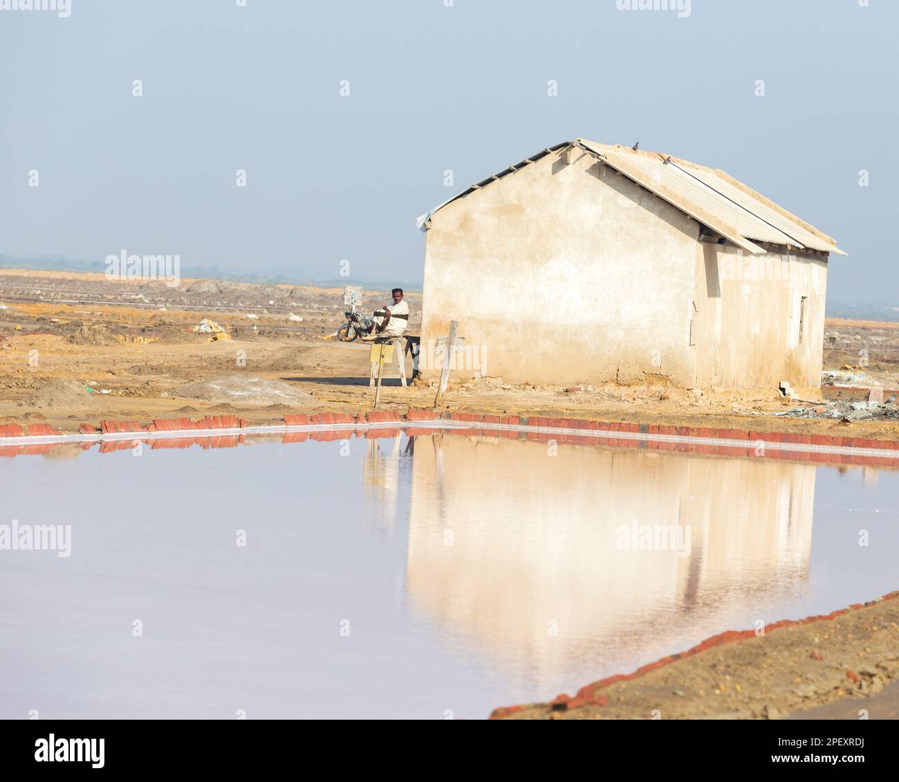 Bhambore Sindh Pakistan 2022, Labor collecting and stacking sea salt at ...