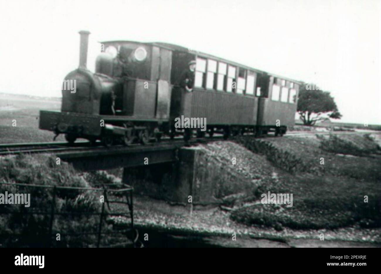 Rye and Camber Tramway - 'Victoria' with train crosses Broadwater ...