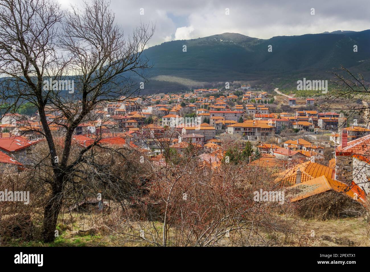 Agios Athanasios, Greece traditional village with red tile rooftops on ...