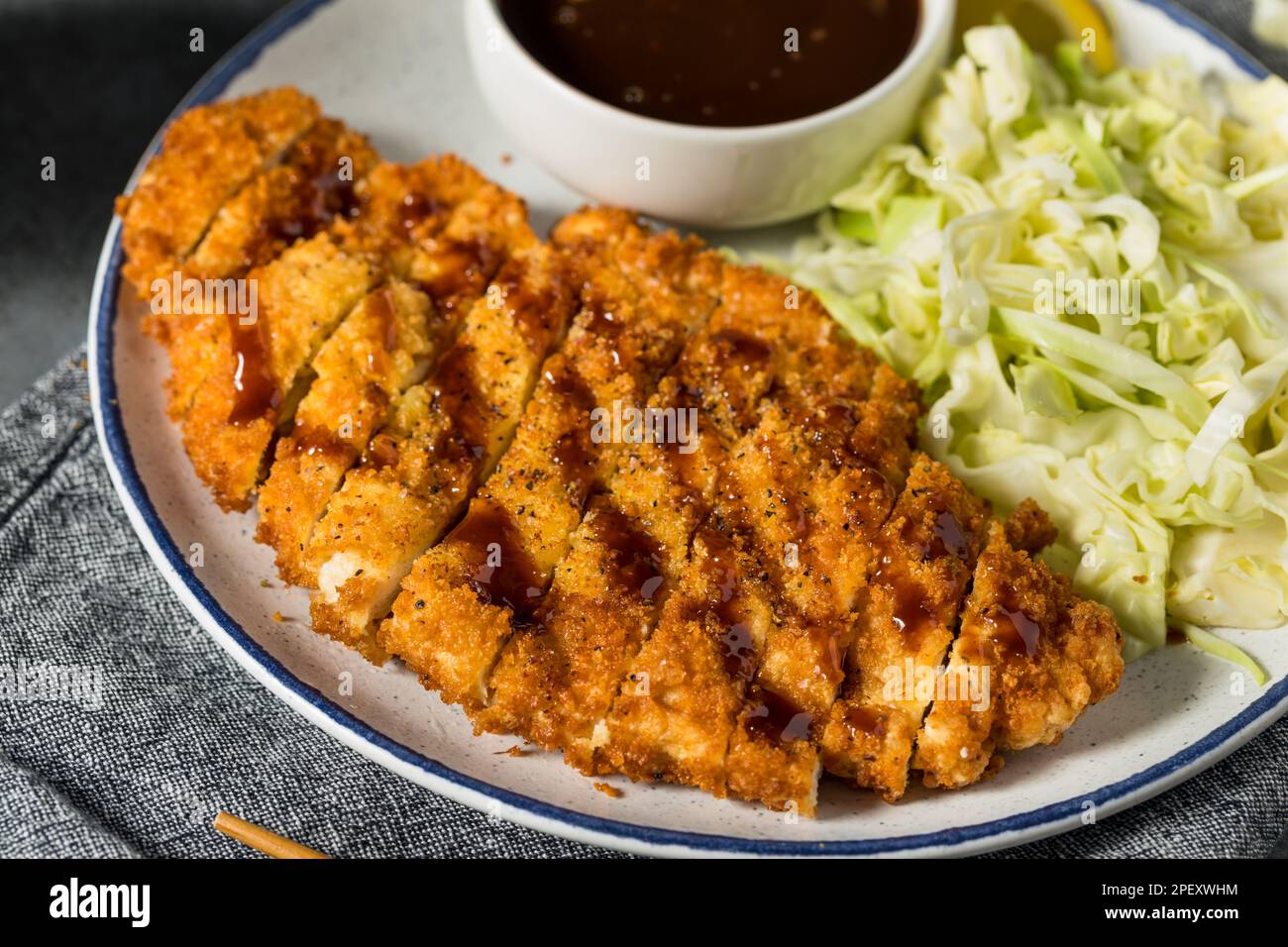 Homemade Japanese Chicken Katsu with Cabbage and Tonkatsu Sauce Stock ...