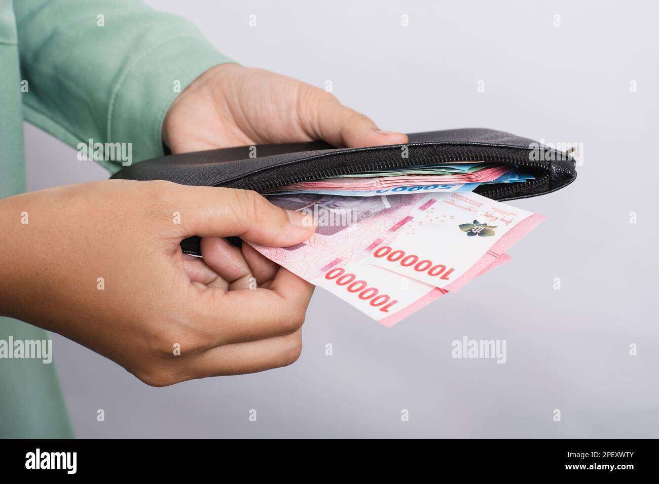 One hundred thousand rupiah money (Rp. 100.000 Seratus Ribu Rupiah), Indonesian currency cash ...