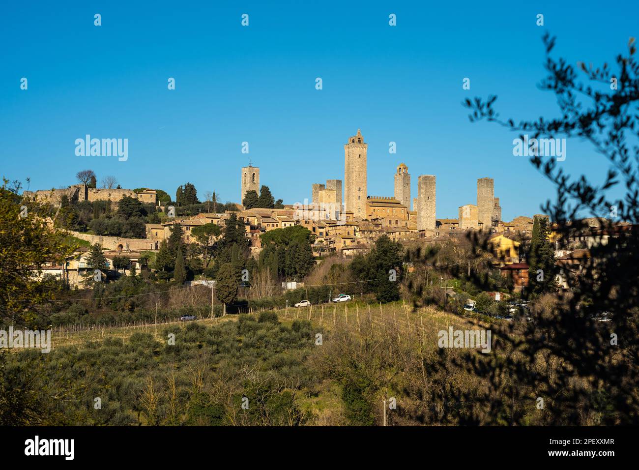 The medieval walled hill town of San Gimignano, a popularedestination ...