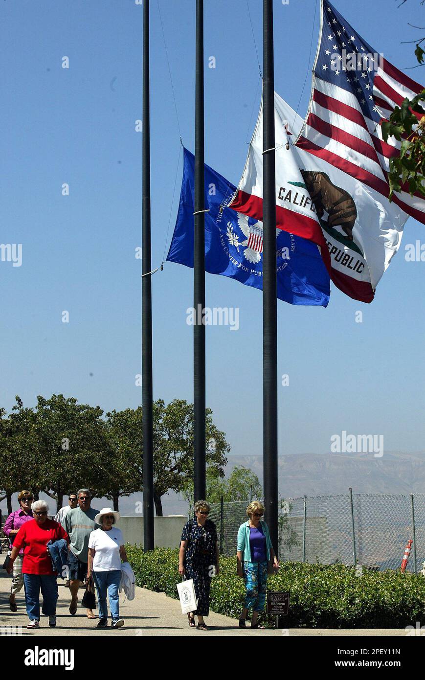 As visitors leave, flags fly at half-staff in honor of former President ...