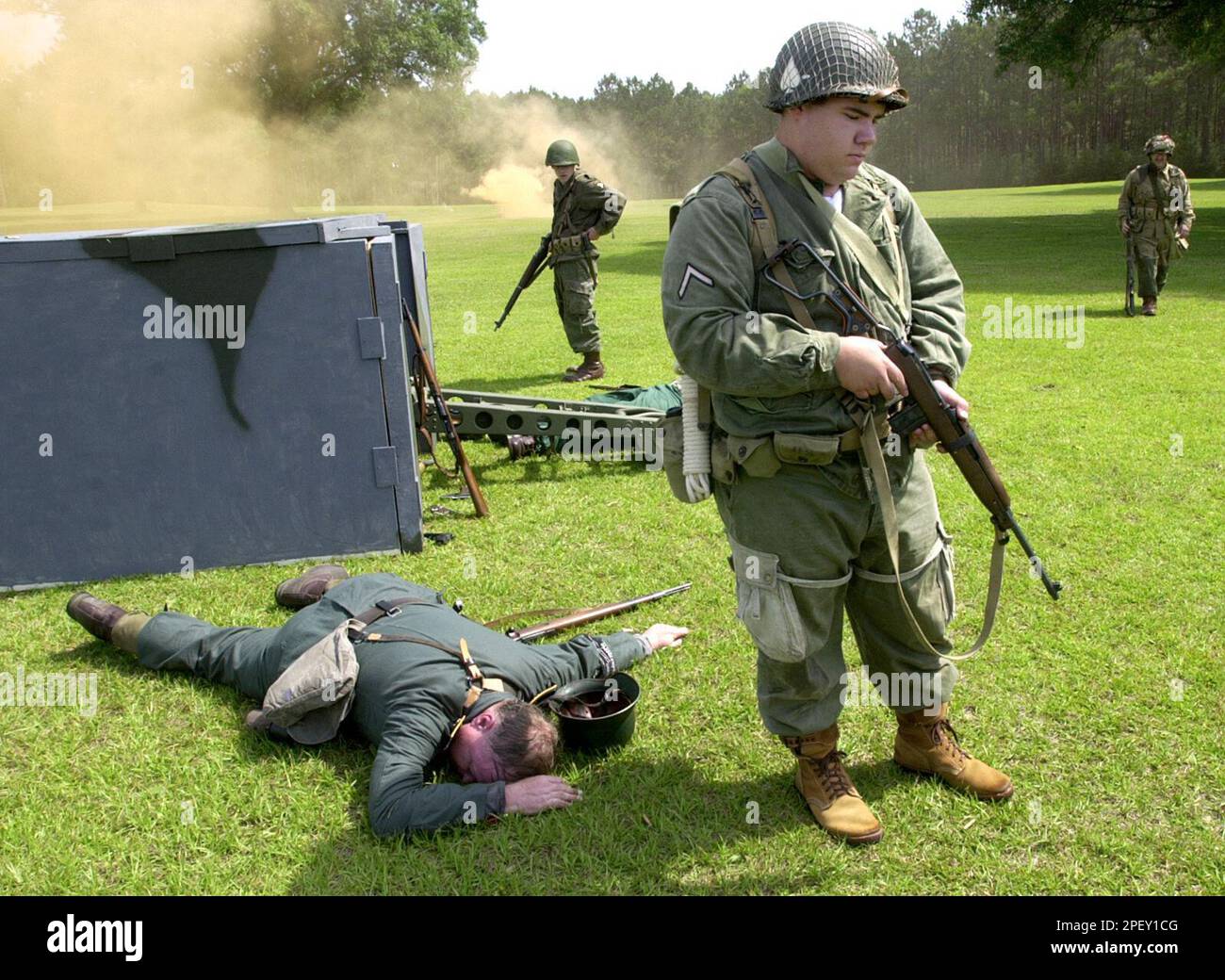 Michael C. Ling, right, and Ryan Freyder, background, look over the ...