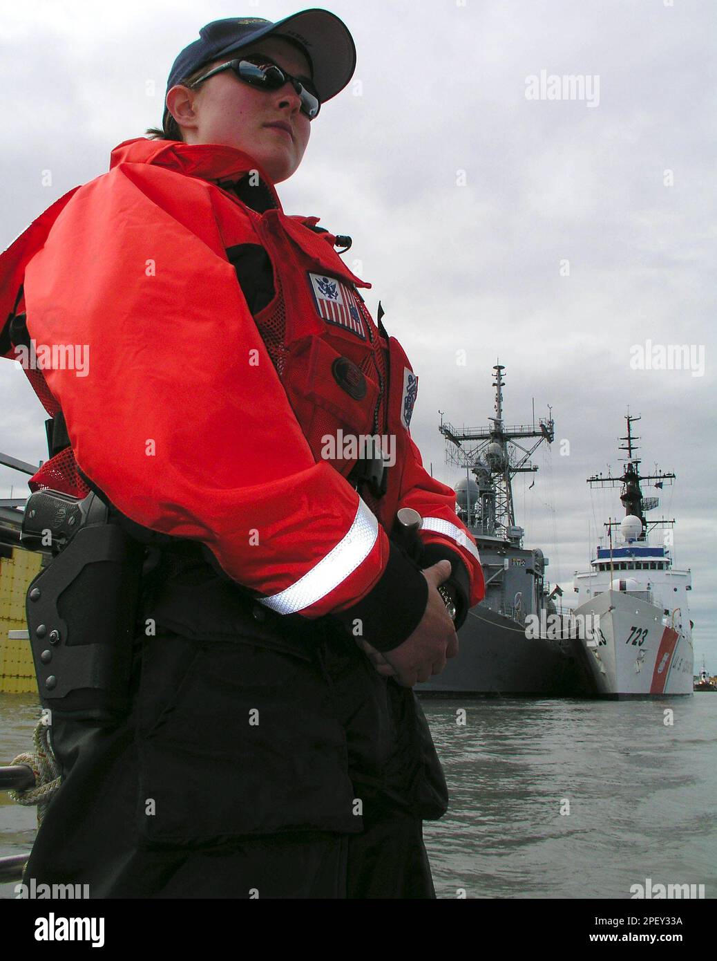 With the U.S. Coast Guard cutter Rush, right, and U.S. Navy frigate USS Ford in the background U ...
