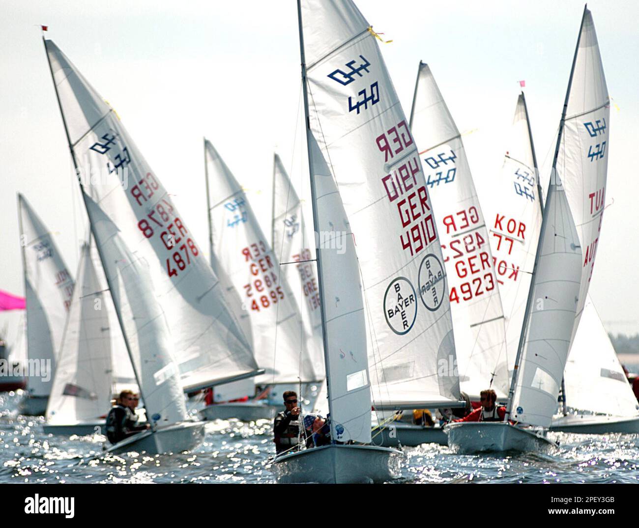 Sailing boats of the 470 series are seen during the first heat of the ...