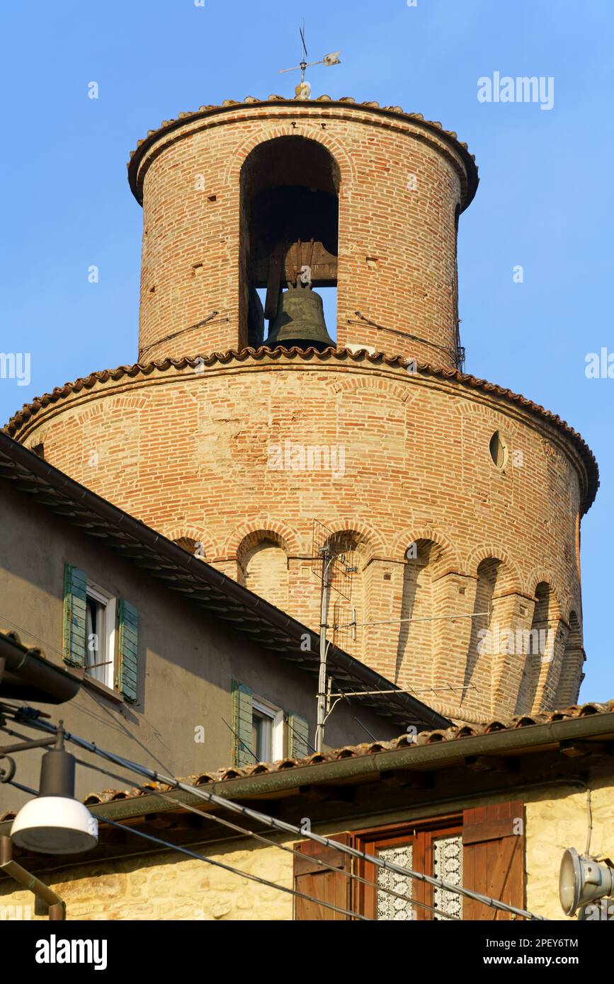 The medieval, bell tower of Castrocaro Terme among the houses of the ...