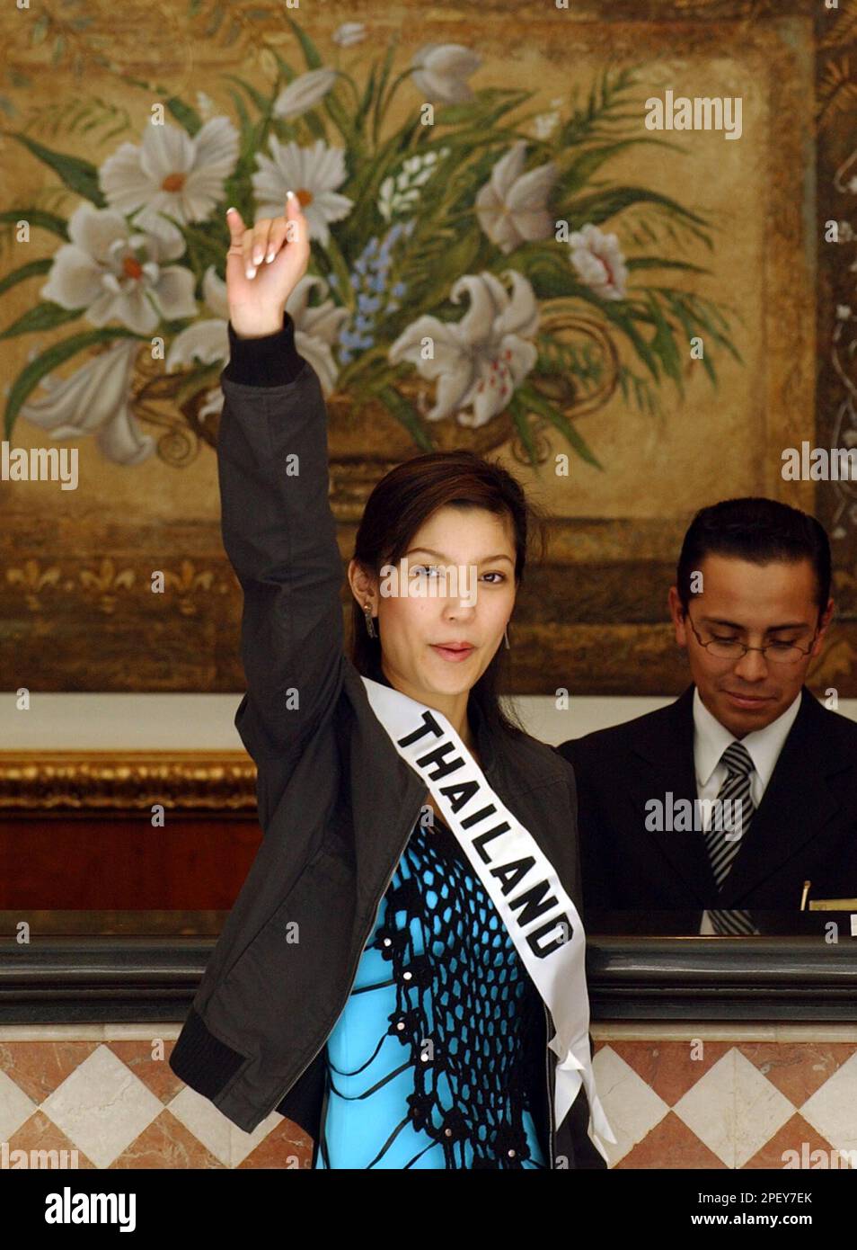 Morakot Kittisara, Miss Thailand, gestures in a hotel in Quito, Ecuador ...