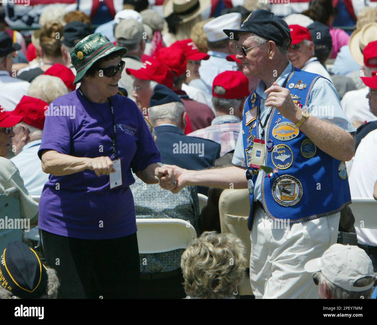A veteran dances in the aisle as he waits fot the dedication of the ...