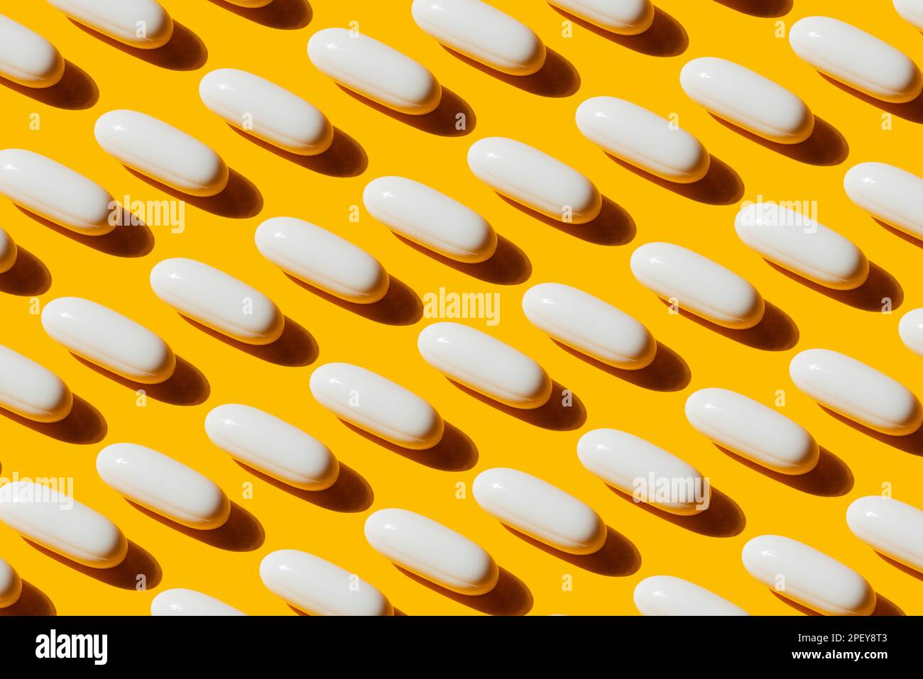 Yellow capsule pills hi-res stock photography and images - Alamy