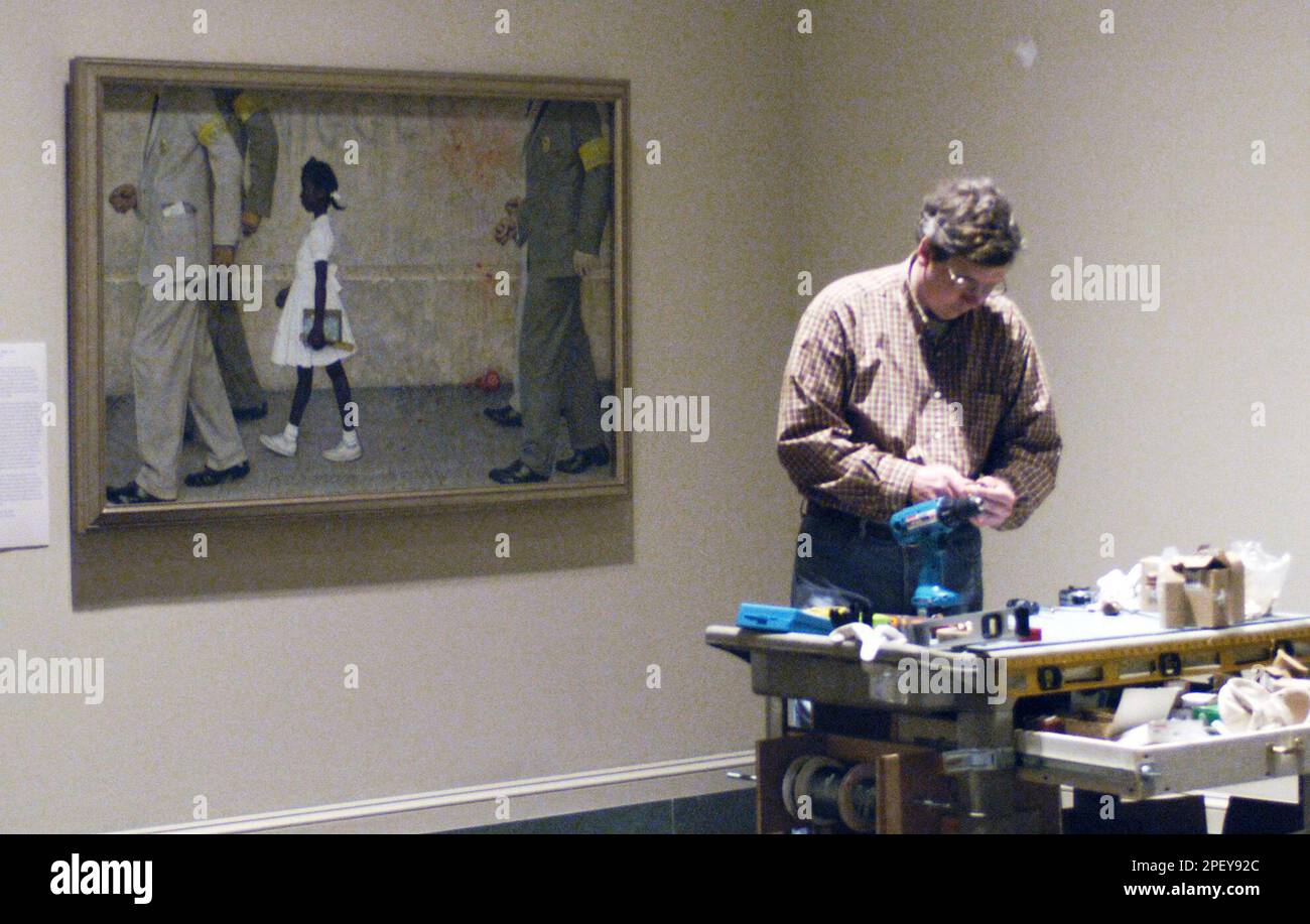 A worker at The Norman Rockwell Museum makes preparations in one of the ...