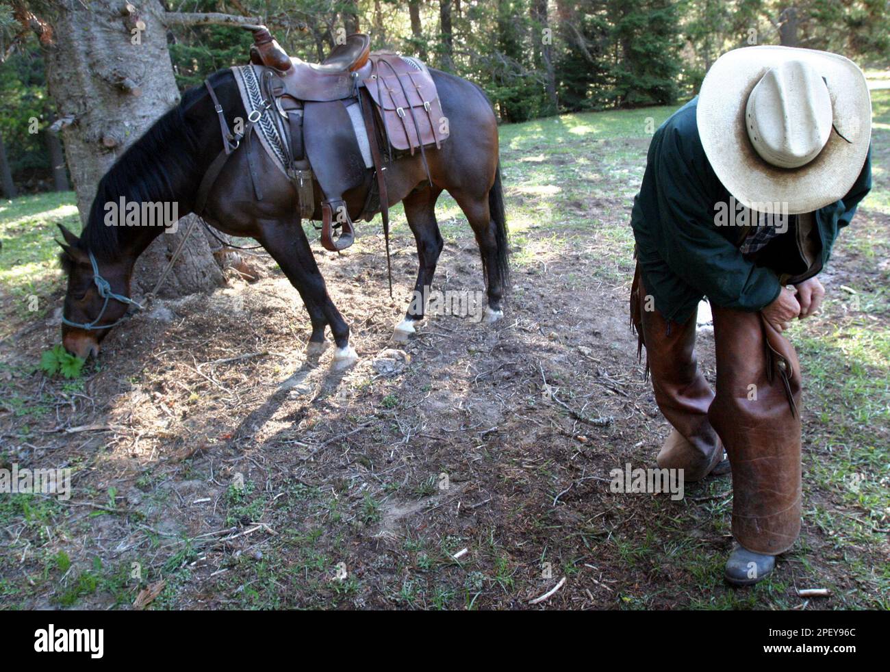 ** ADVANCE FOR WEEKEND EDITIONS, MAY 29-30 ** Larry Ross puts on his ...