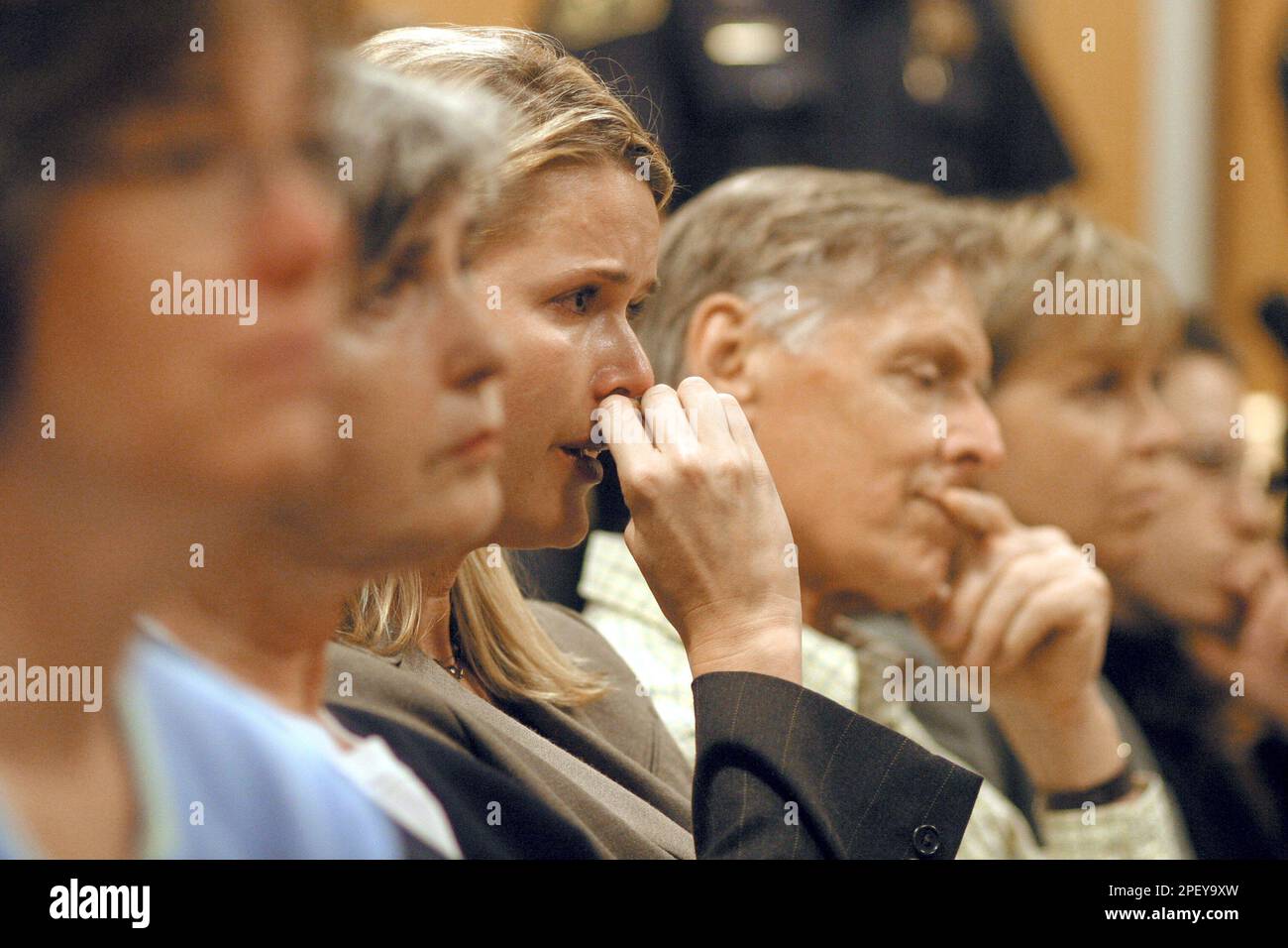 Carol Burns, second from left, mother of defendant Glen Sebastian Burns ...