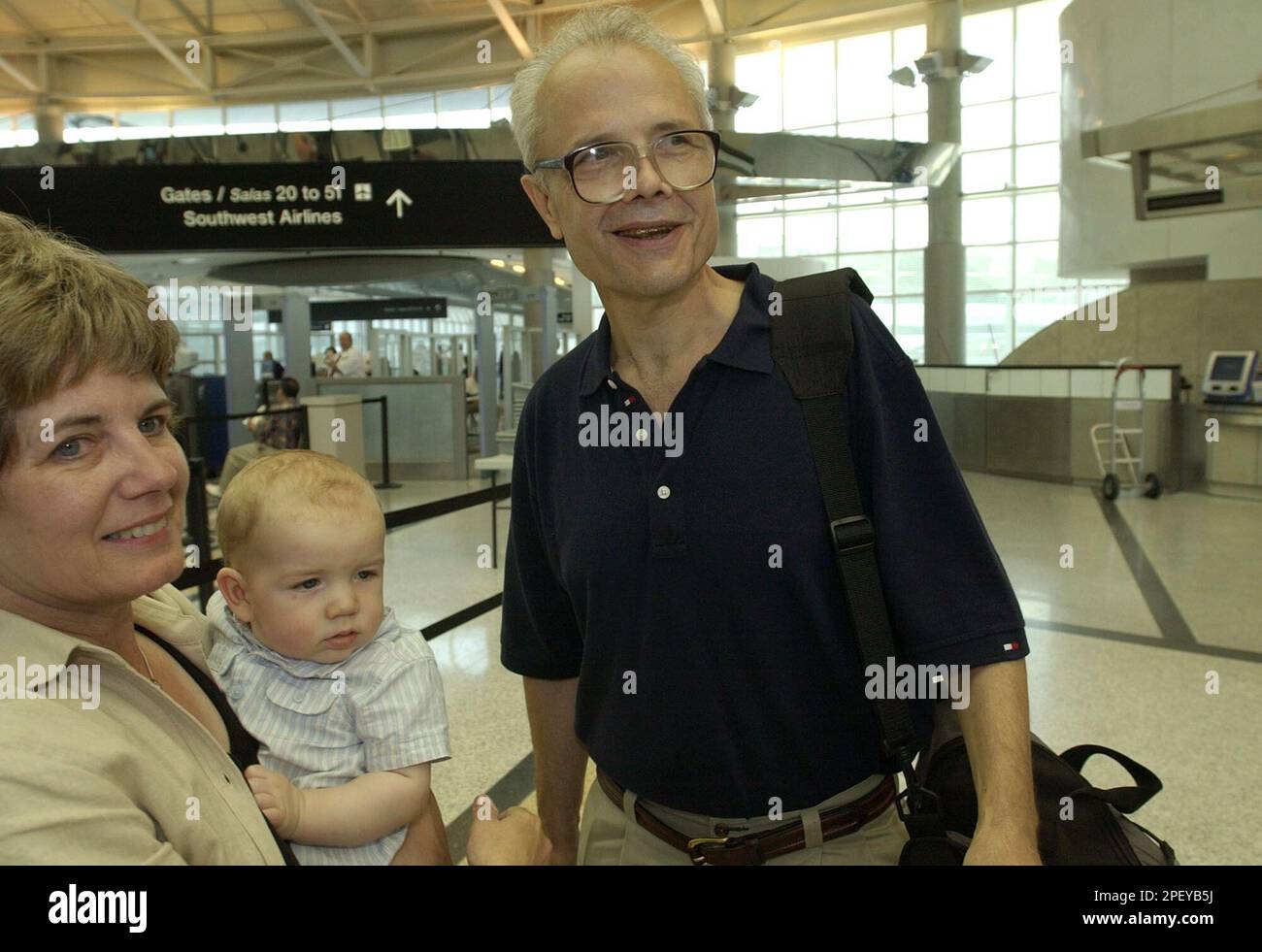 ** CORRECTS TO SISTER-IN-LAW CYNTHIA OTT ** Gregory Ott, right, smiles ...