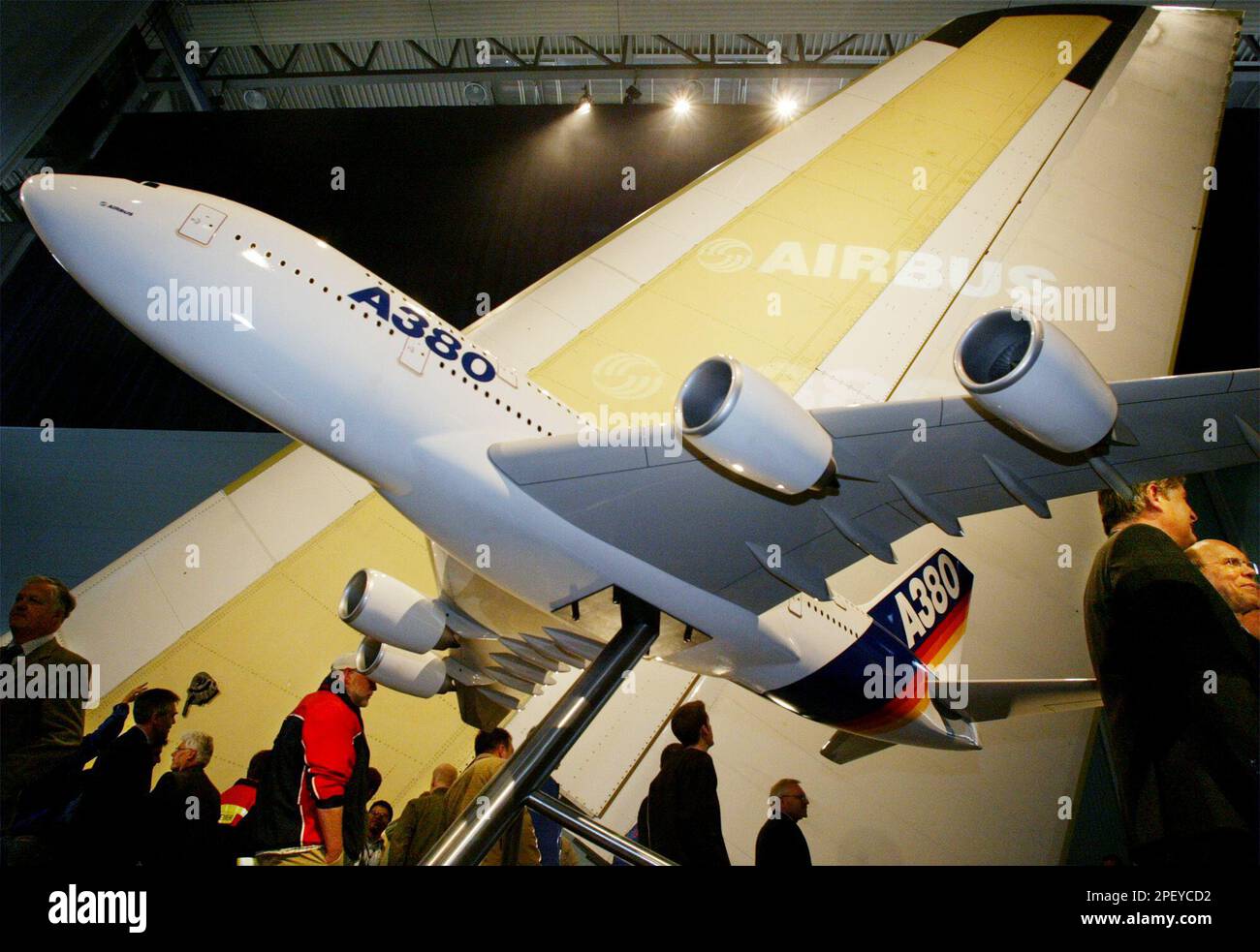 Airbus workers and guests look the first 14 meters (46 feet) tall ...