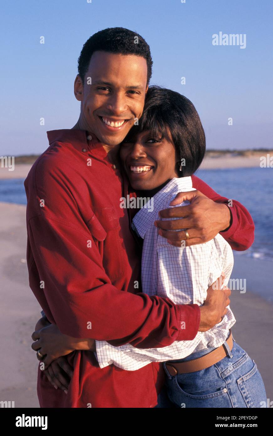 Romantic african-American couple having fun in the summertime on the ...