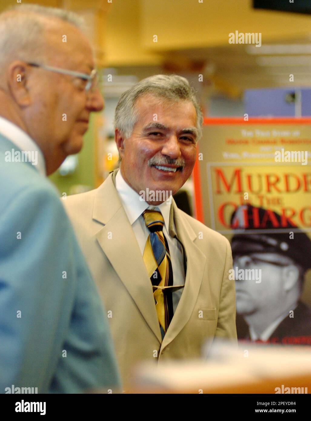Former mayor of York, Pa., Charlie Robertson, left, stands beside his ...