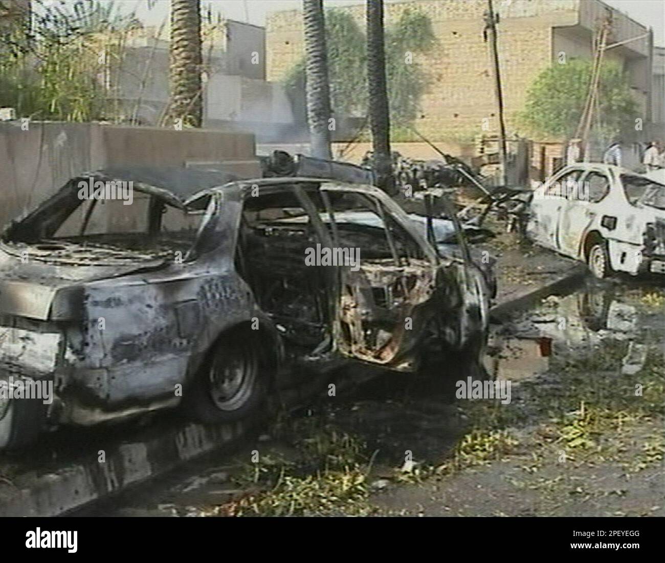 The scene of a car bomb which exploded Saturday May 22, 2004, in front ...