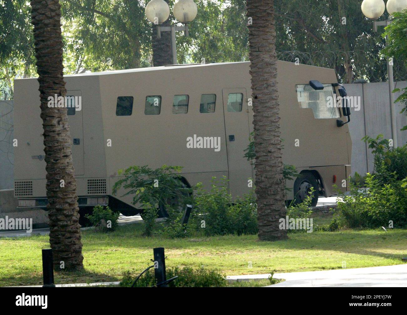 A military armoured bus arrives at the "Green Zone" in Baghdad, Iraq ...